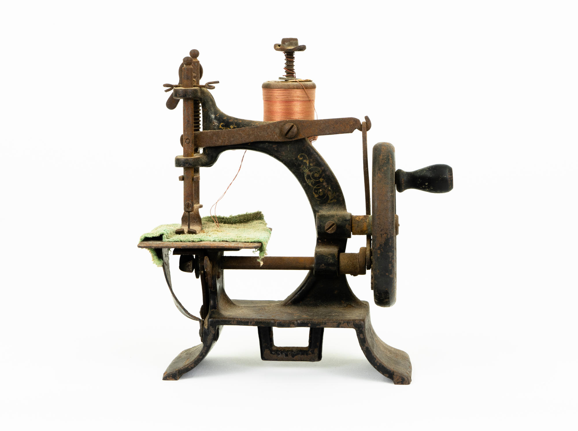 Miniature sewing machine - Tauranga Heritage Collection